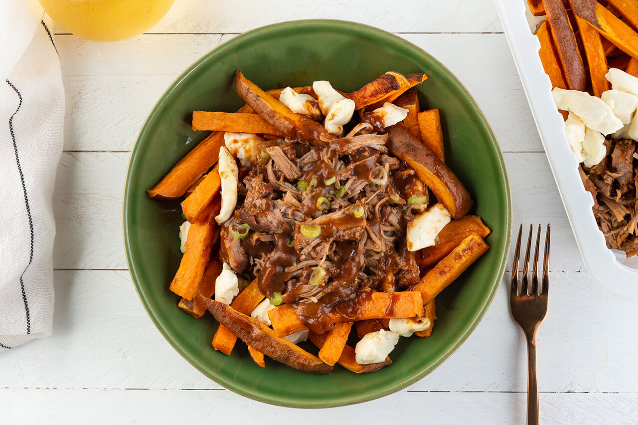 Pulled pork poutine with dark BBQ sauce